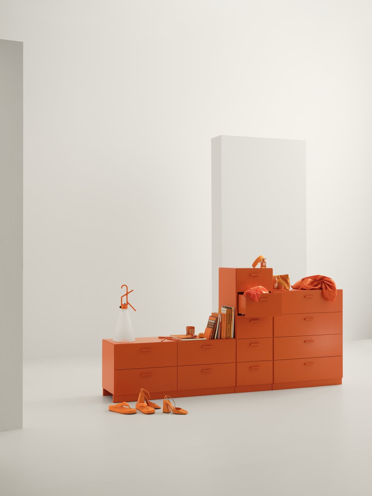 String Furniture Relief chest of drawers with legs, tall, orange ...