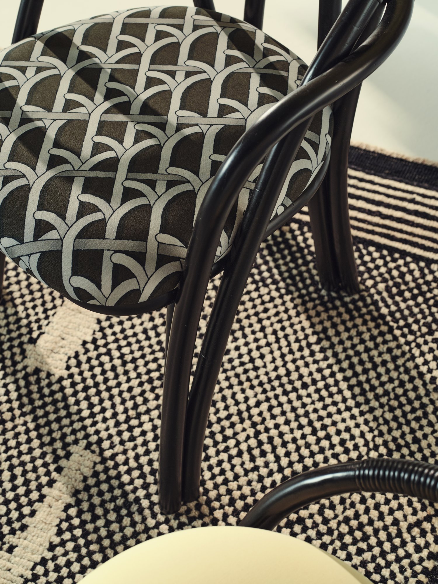 GUBI Bistra dining armchair, ebony painted rattan - Reales Pattern 003 | Finnish Design Shop