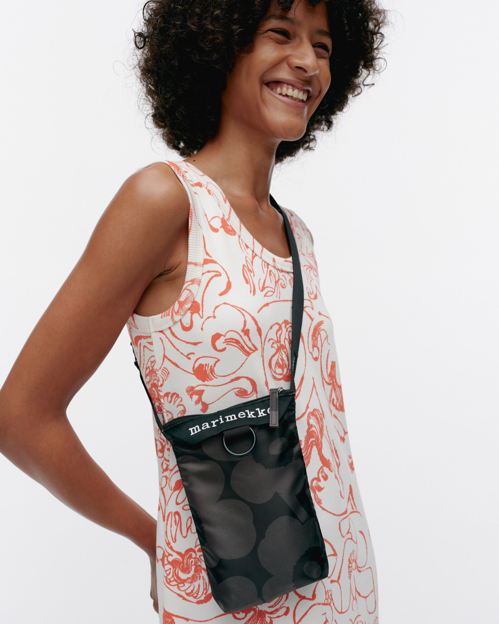 Marimekko Neat Unikko phone pocket, dark grey - grey | Finnish Design Shop