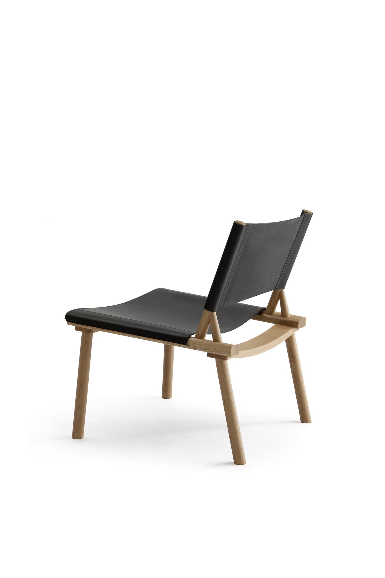 Nikari December lounge chair, oak - black leather | Finnish Design Shop
